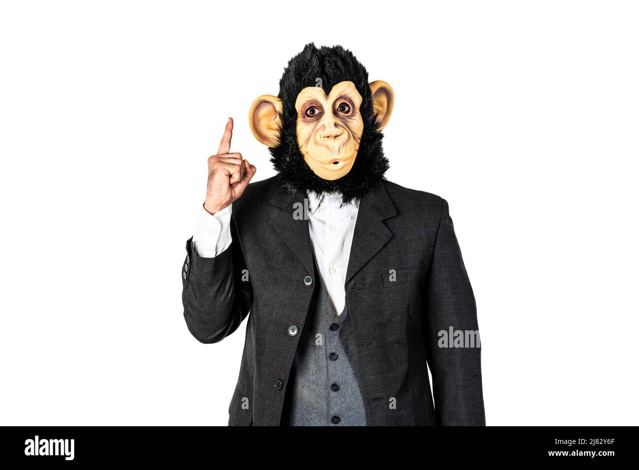 Monkey man pointing upward with his index finger Stock Photo - Alamy