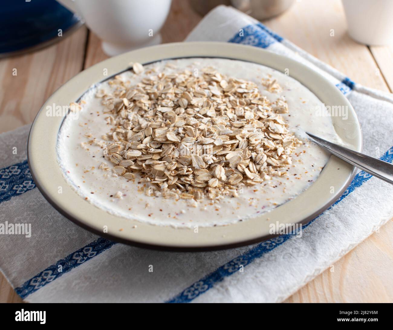 Breakfast yogurt with pureed apple and oatmeal Stock Photo - Alamy