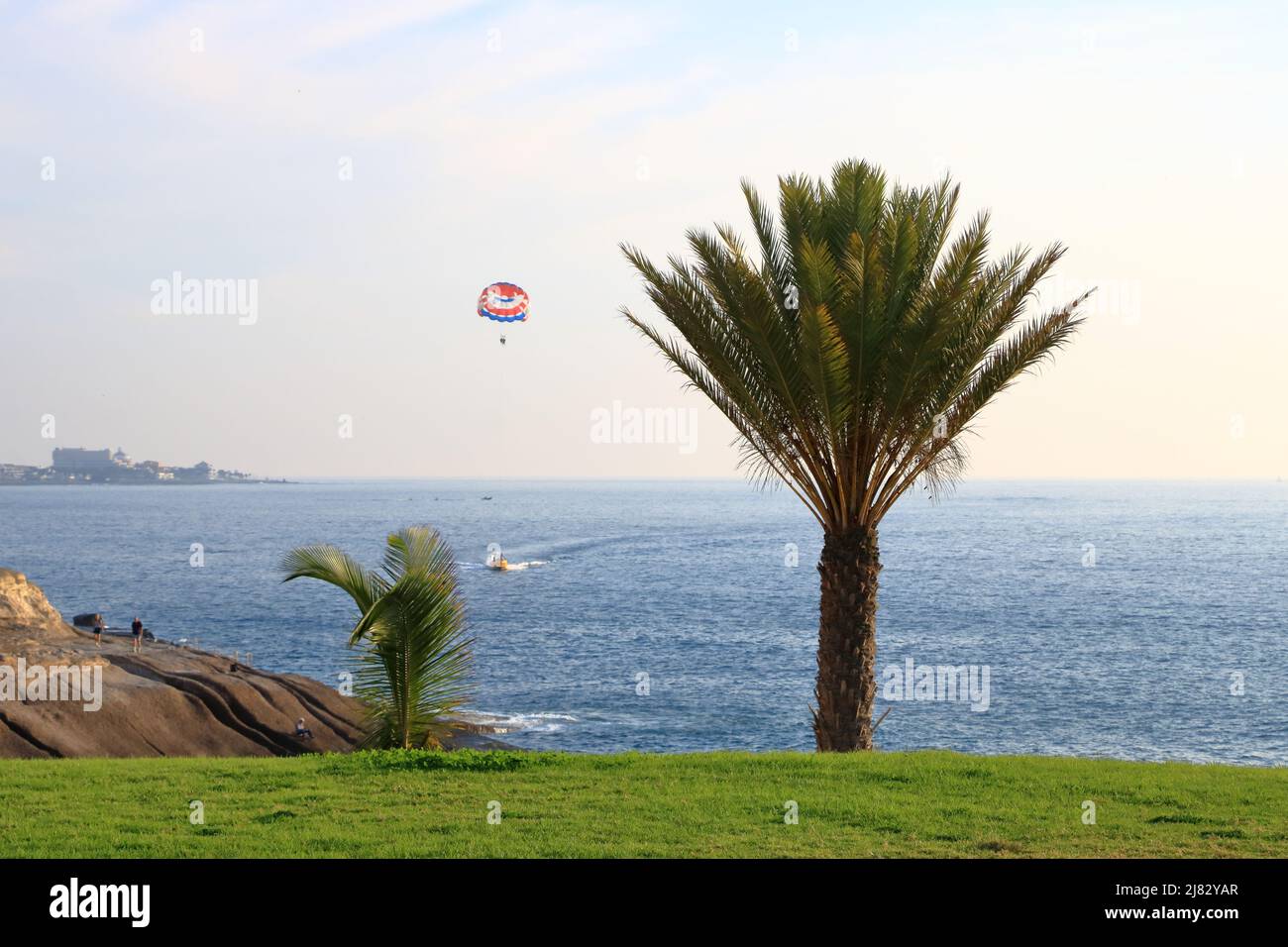 Skydiving skydiver and passenger tandem parachute approach on the ...
