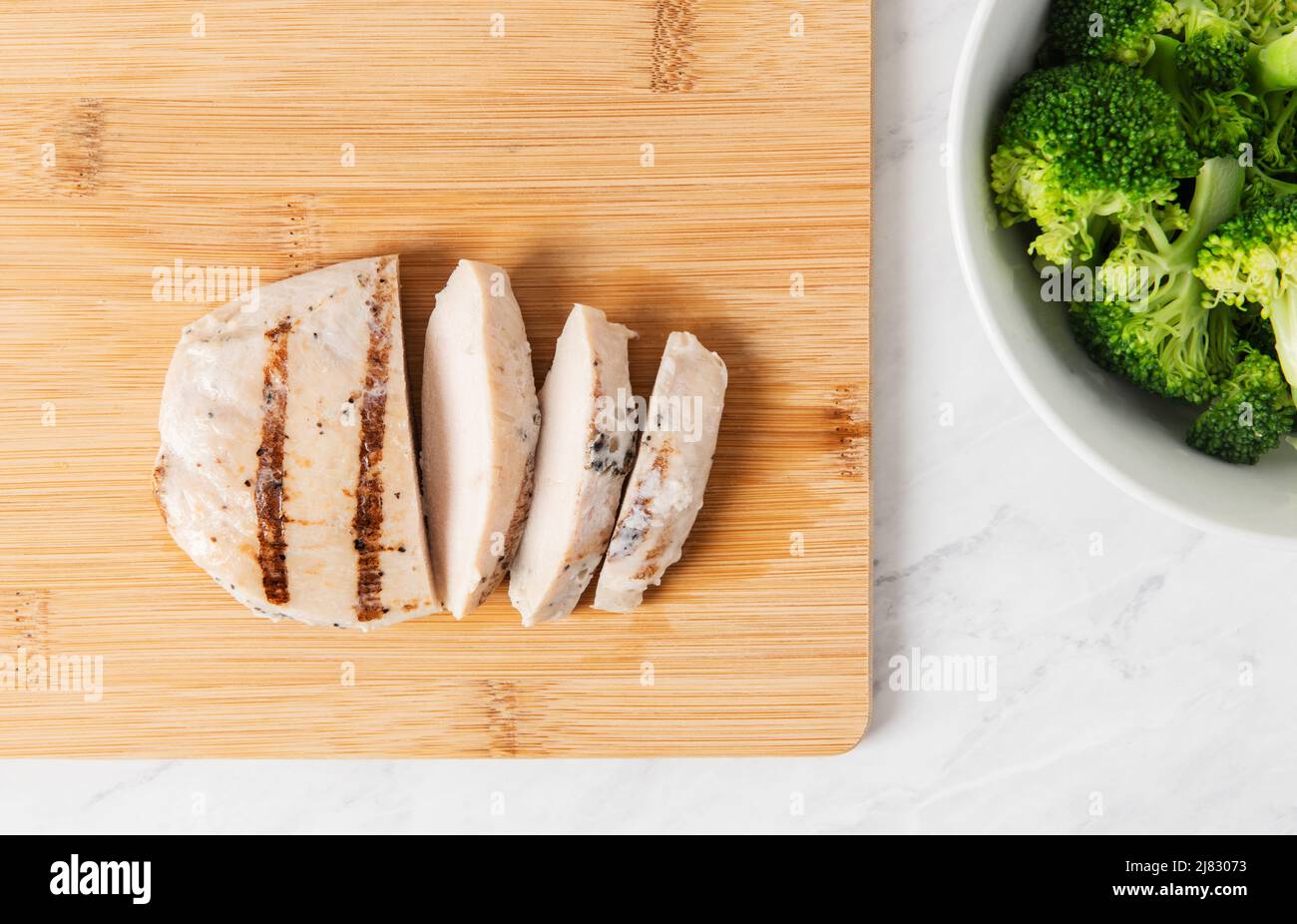 Chicken and steamed broccoli being prepared Stock Photo - Alamy