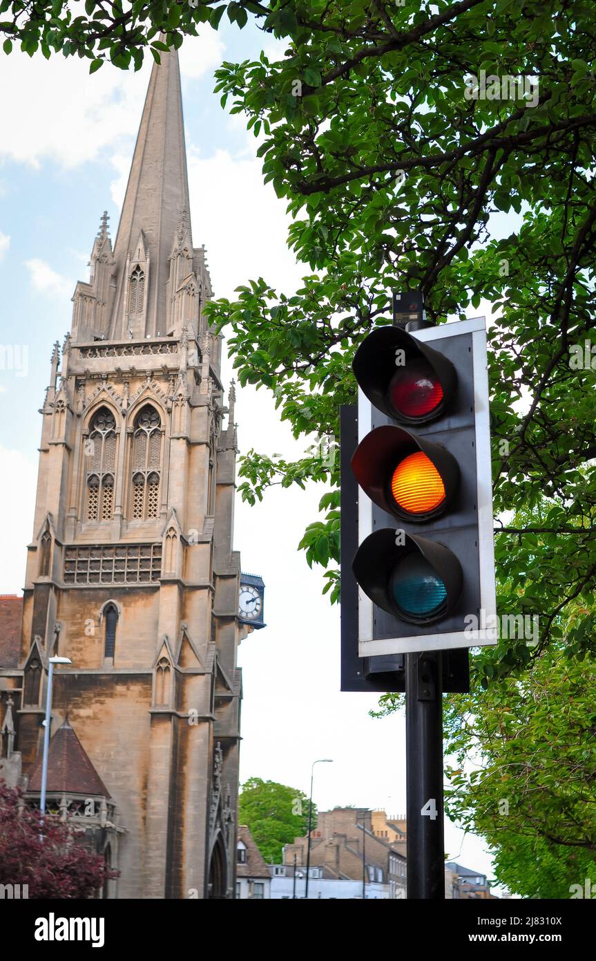 Traffic light on the English old city yellow light Stock Photo - Alamy