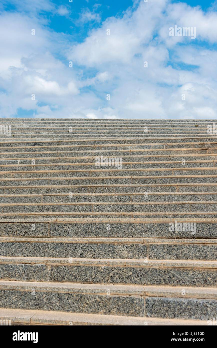 Modern outdoor steps leading up to a blue sky Stock Photo - Alamy