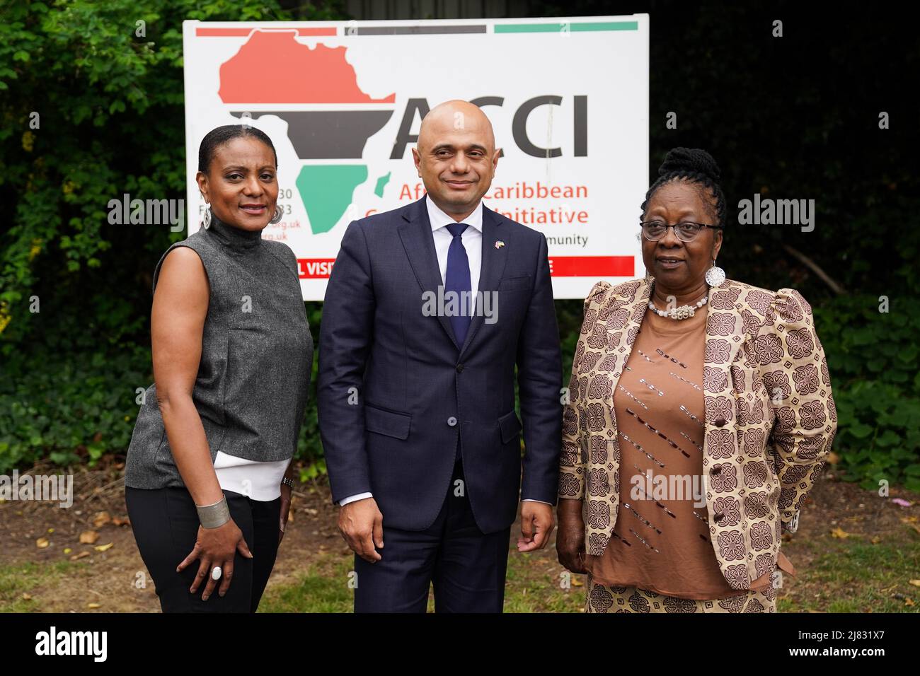 Health Secretary Sajid Javid is met by Alicia Spence and Patricia ...
