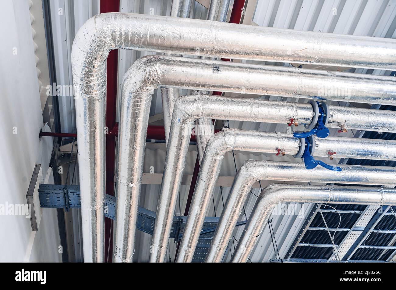 pipeline in heat-insulating covering at production plant Stock Photo ...