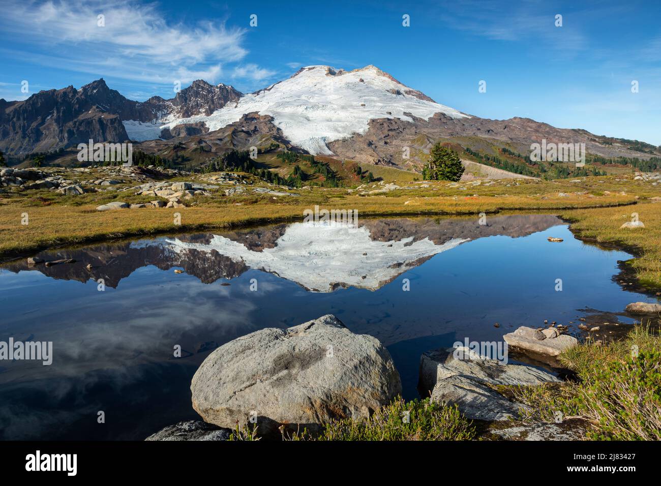 WA21560-00...WASHINGTON - Mount Baker reflecting in a small tarn along ...