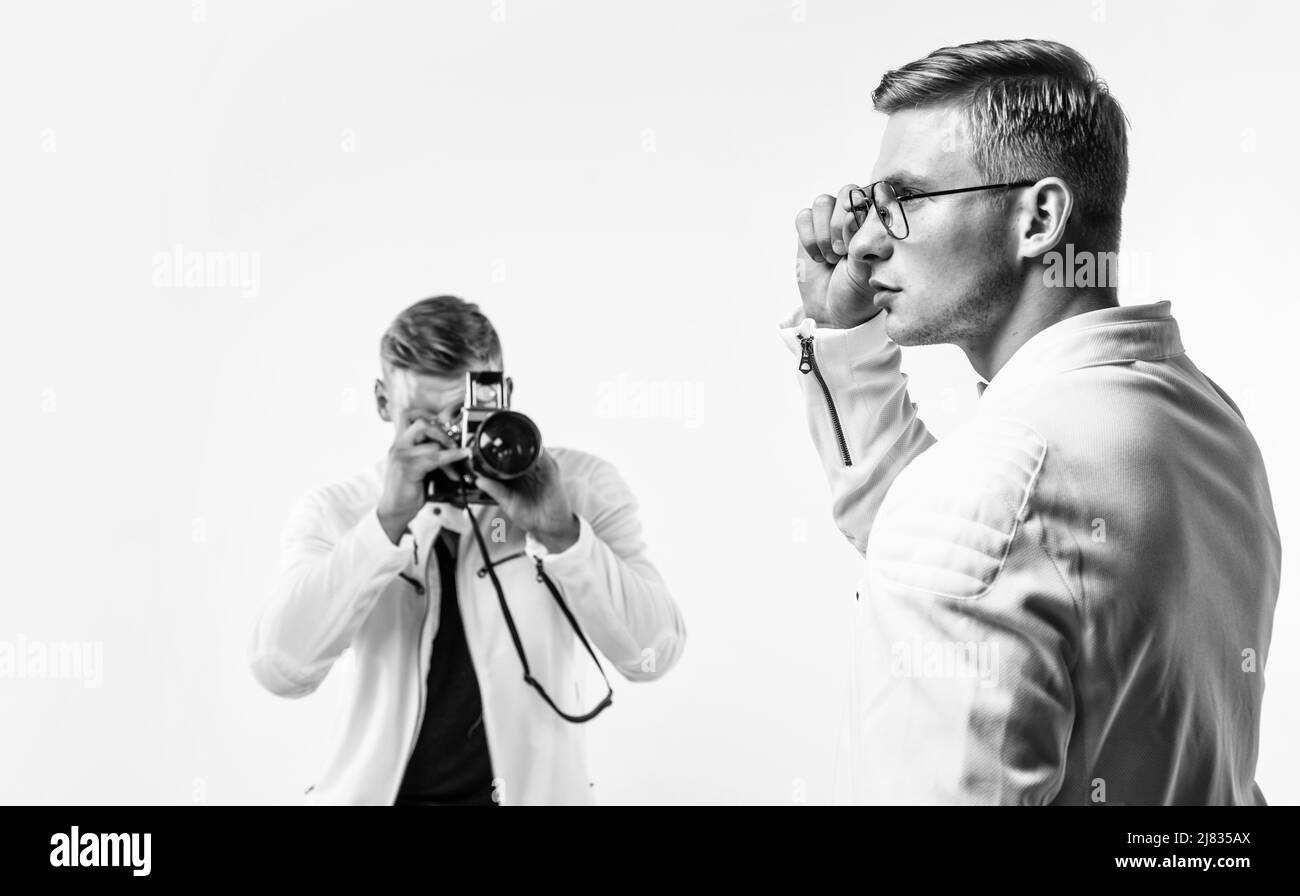 two cousin with retro photo camera. young confident brothers. confident ...