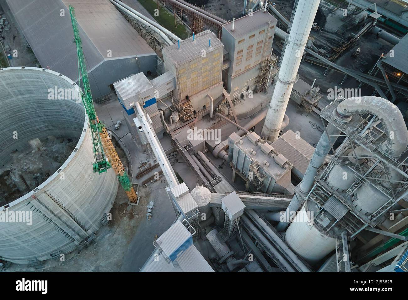 Aerial view of cement factory with high concrete plant structure and ...