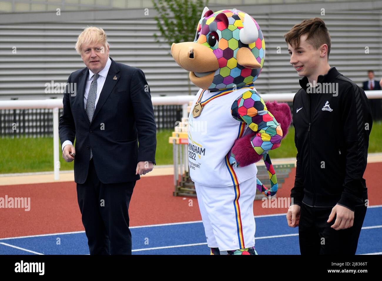 Prime Minister Boris Johnson (left) with the Commonwealth Games Mascot ...