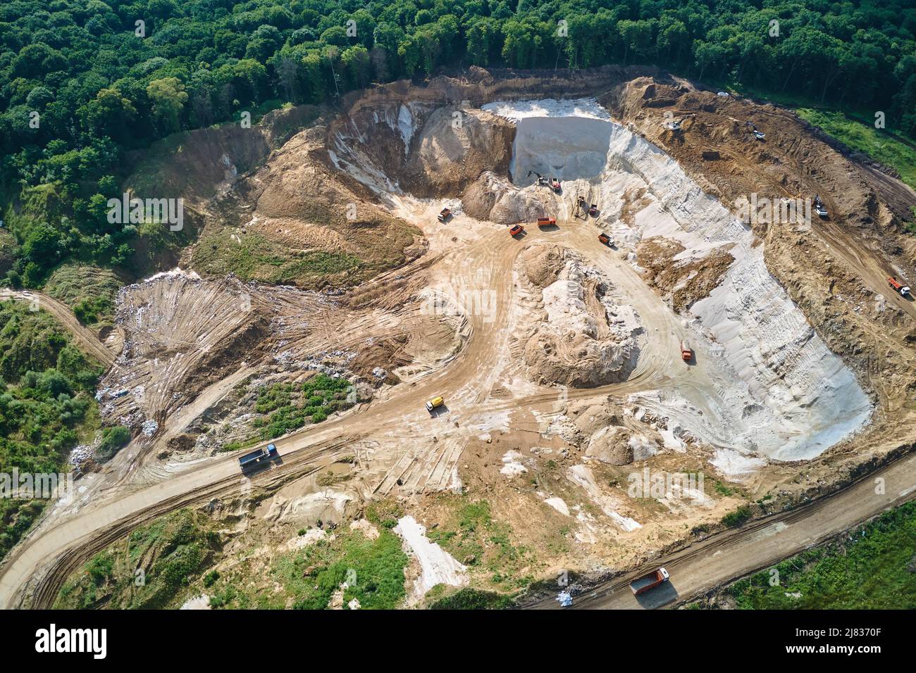 Aerial view of open pit mining site of limestone materials for ...