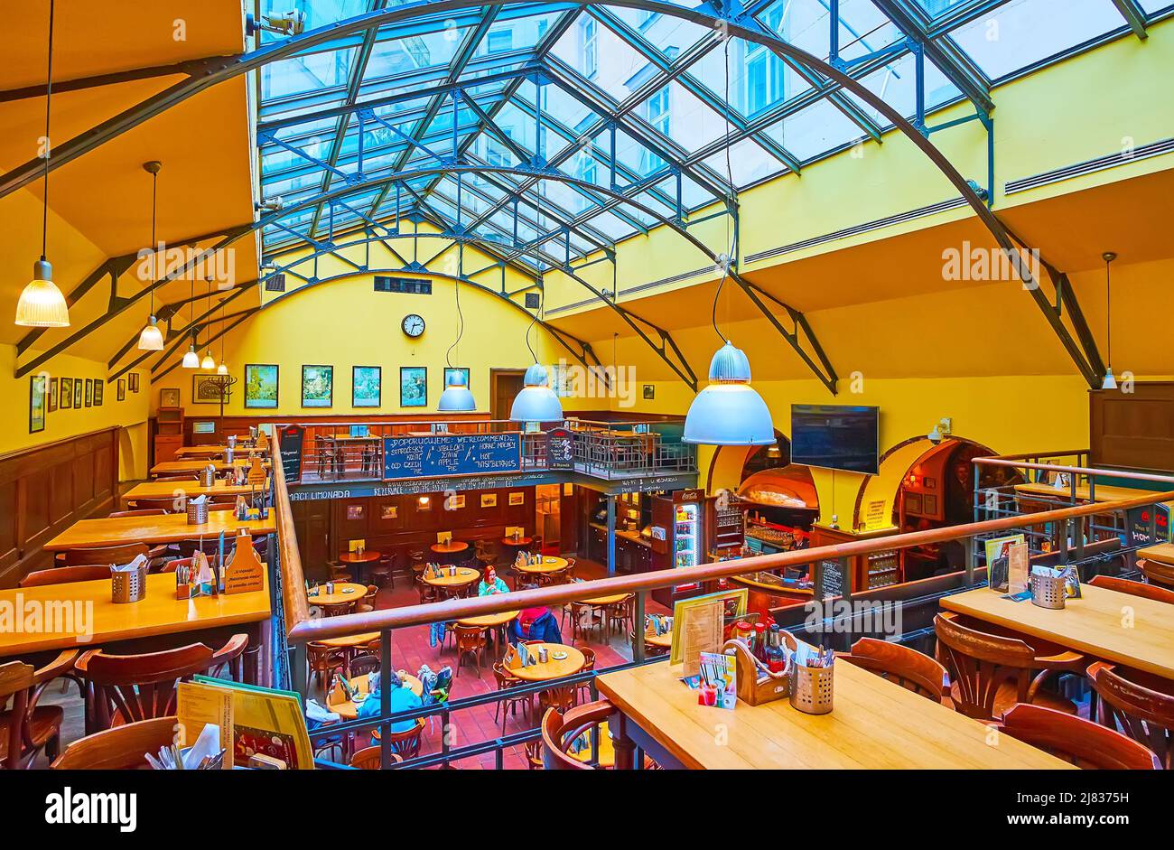 PRAGUE, CZECH REPUBLIC - MARCH 5, 2022: Interior of large restaurant ...