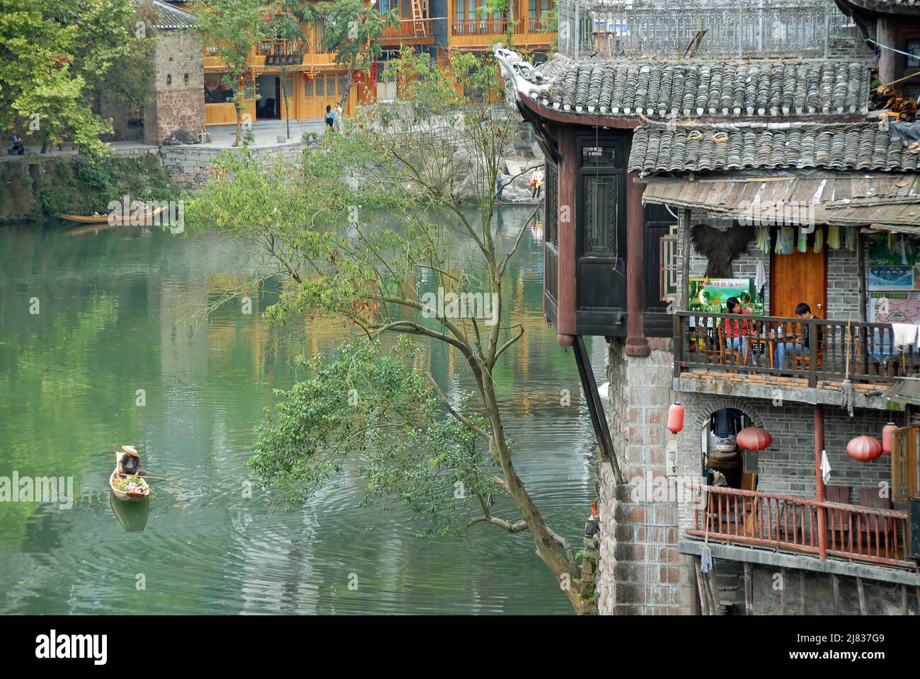 Fenghuang, Hunan Province, China: Old wooden riverside houses in ...