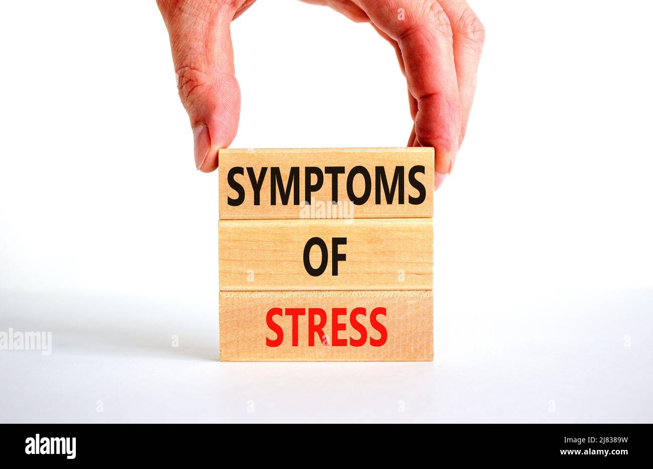 Symptoms of stress symbol. Concept words Symptoms of stress on wooden ...