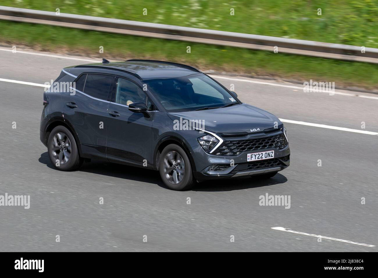 2022 grey Start/Stop KIA Sportage Gt-Line Isg Hev auto Hybrid Electric SUV; driving on the M6 ...