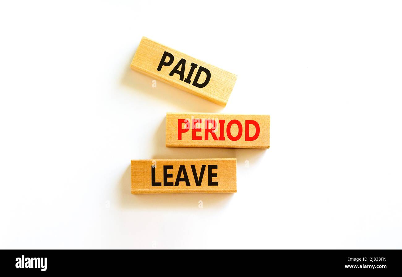 Paid period leave symbol. Concept words Paid period leave on wooden ...