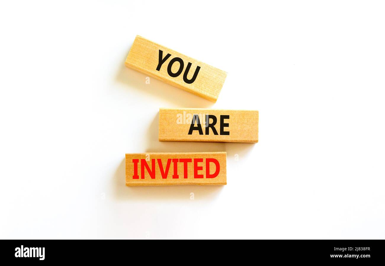 You are invited symbol. Concept words You are invited on wooden blocks ...