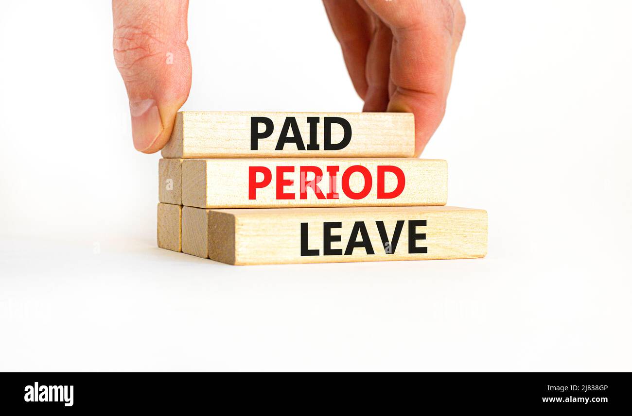 Paid period leave symbol. Concept words Paid period leave on wooden ...