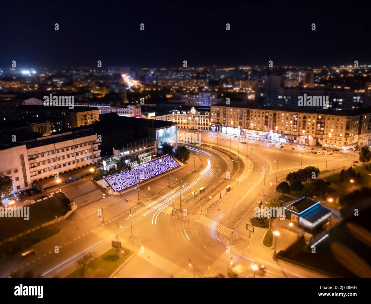 Night city center transport driveway aerial view with long exposure ...