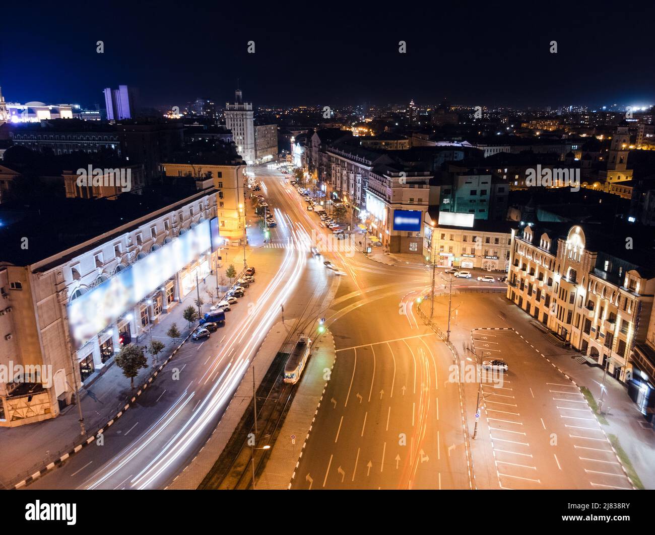 Night city center transport driveway aerial view with long exposure ...