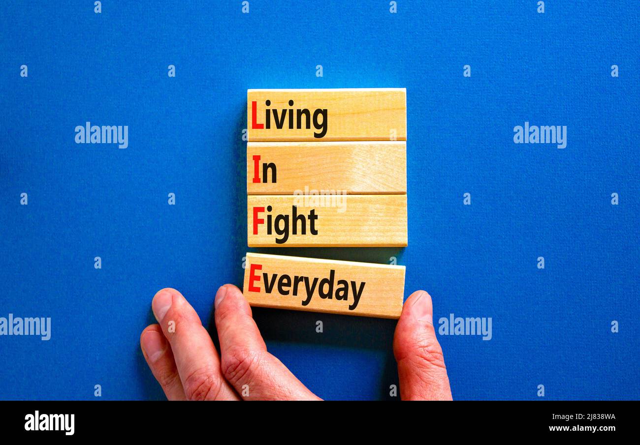 LIFE living in fight everyday symbol. Concept words LIFE living in ...