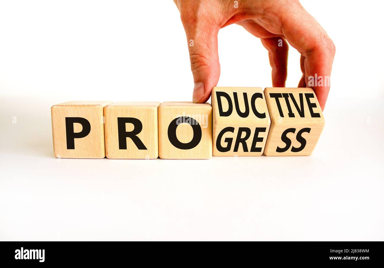 Word progress and productive symbol. Businessman turns cubes and ...