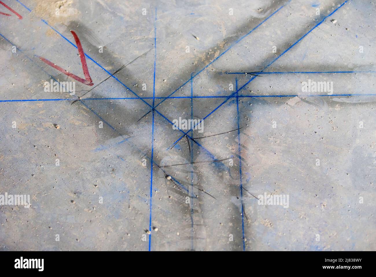 measured outlines on the floor of a concrete Stock Photo - Alamy