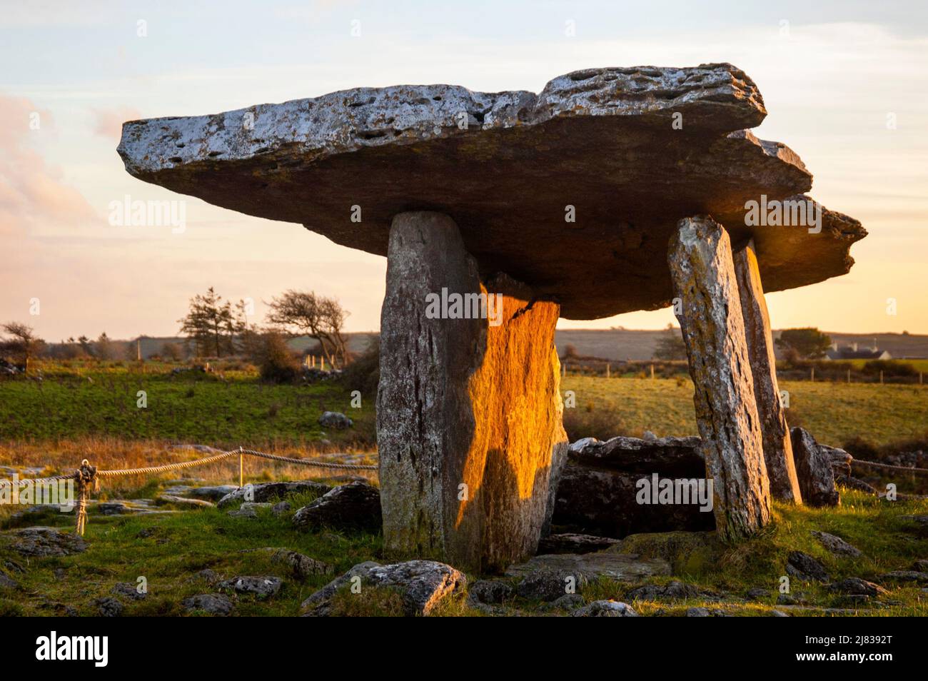Horizontal capstone and standing portal stone of the Poulnabrone Dolman ...