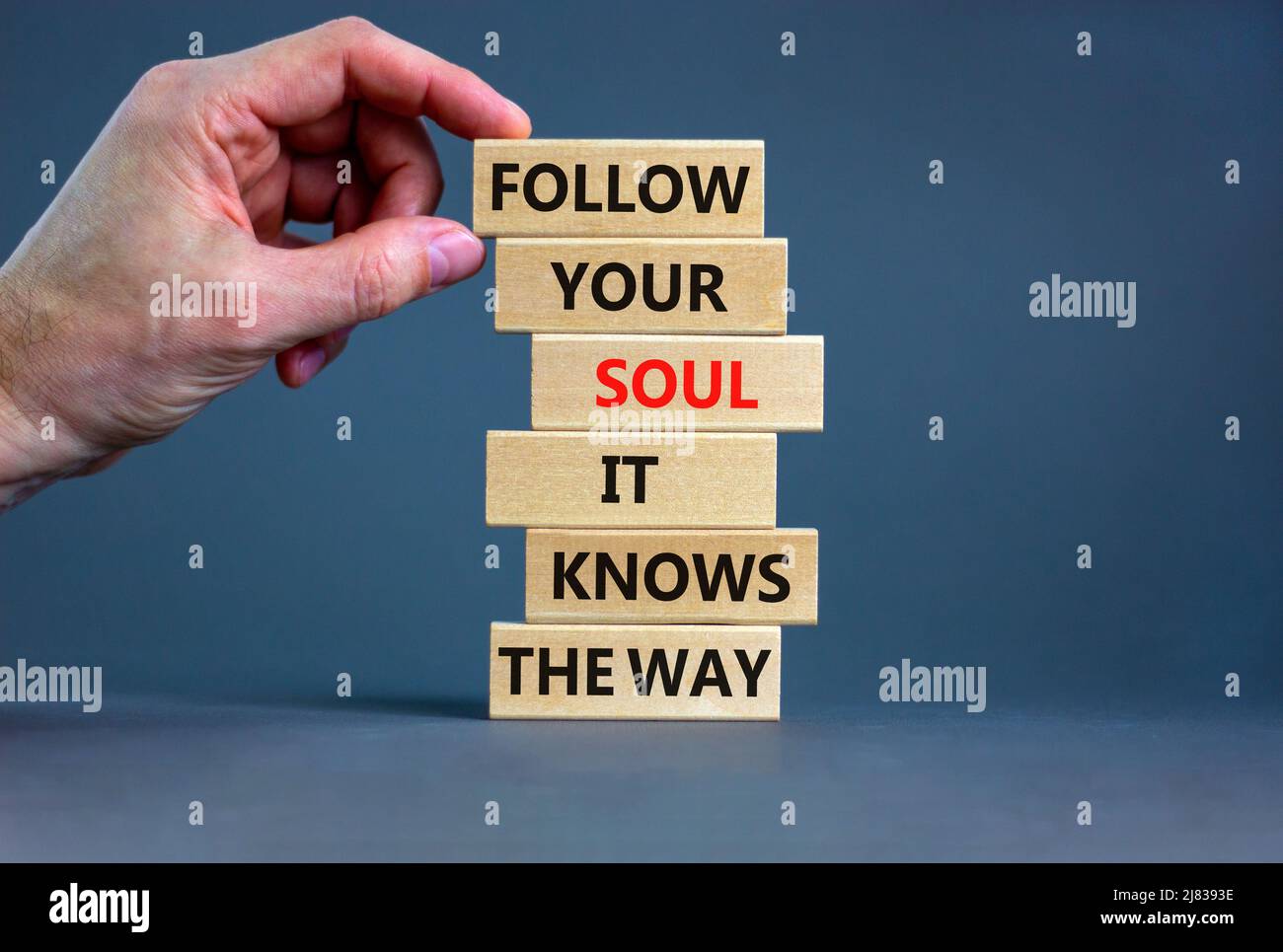 Motivation and inspiration symbol. Wood blocks with words Follow your ...
