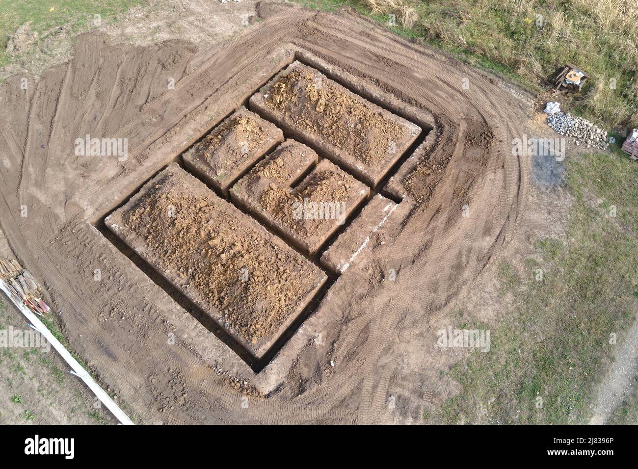 Dug out trench for building works of new house concrete foundation on ...