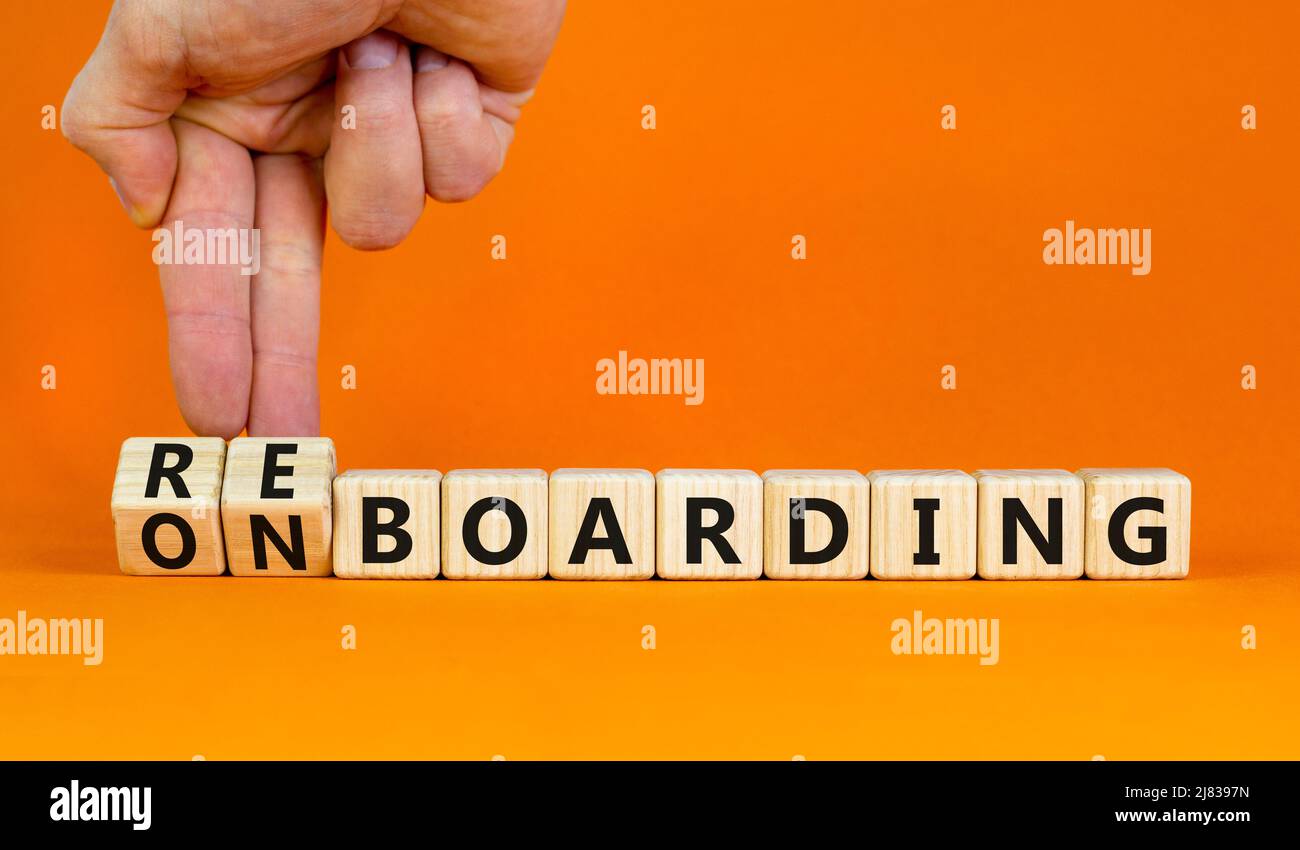 Onboarding or reboarding symbol. Businessman turns wooden cubes and ...