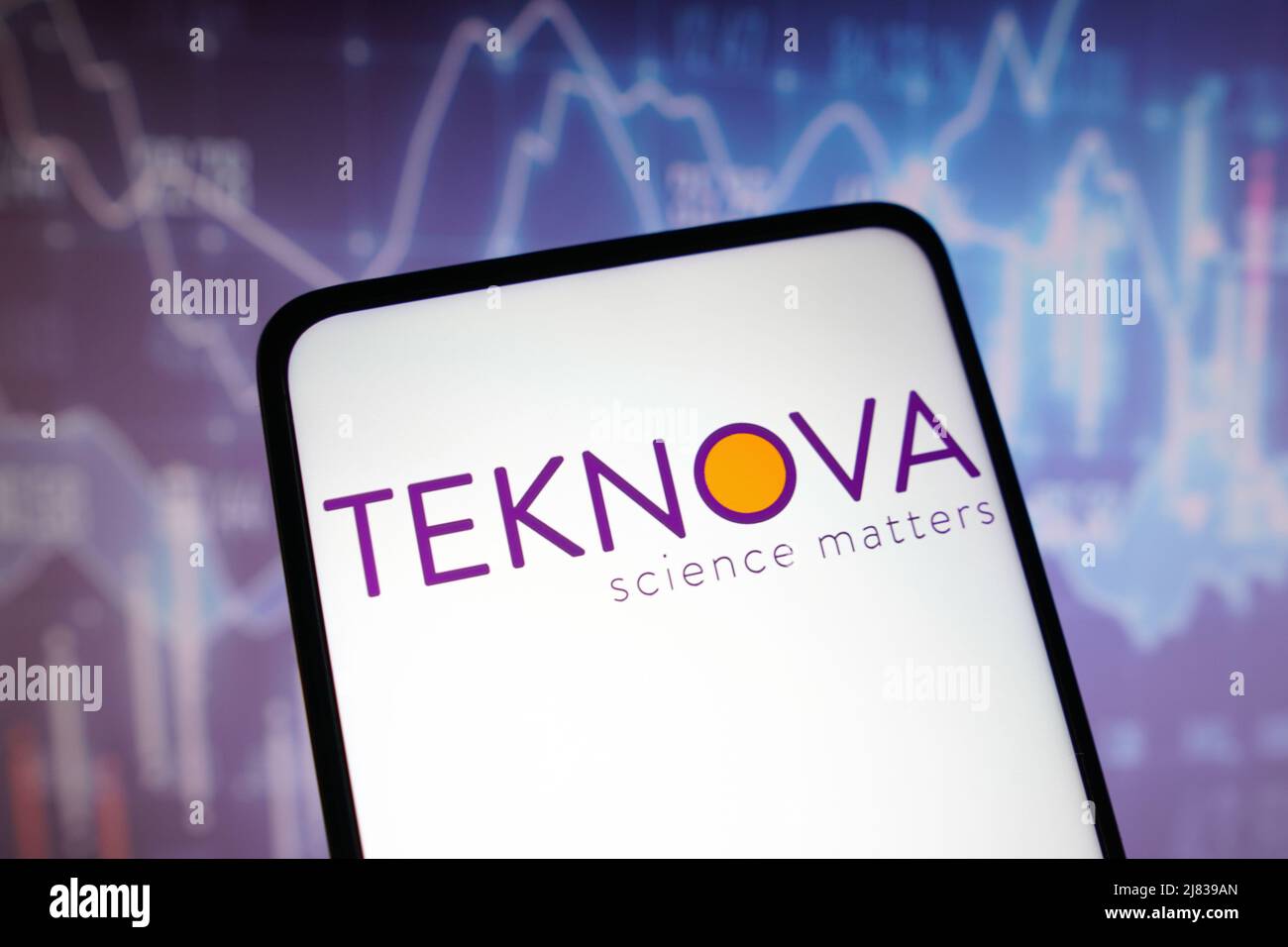 In this photo illustration, the Teknova logo seen displayed on a smartphone screen Stock Photo ...