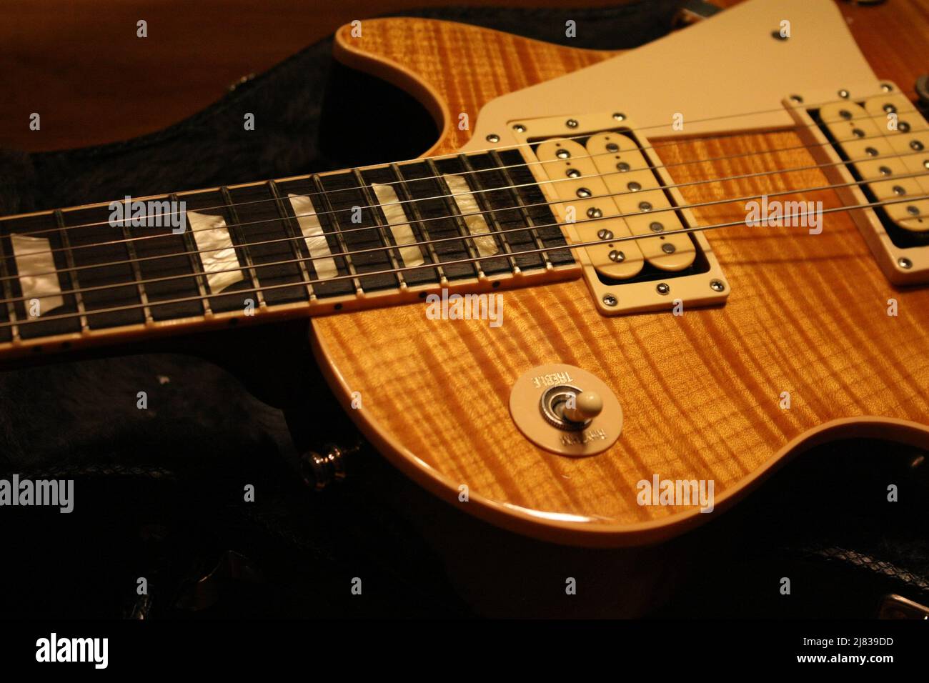 Photo of Les Paul guitar maple top, showing a high degree of natural ...