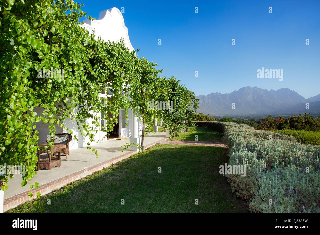 Lush Lawn and Cape Dutch Architecture at La Cotte Villa, Franschhoek ...