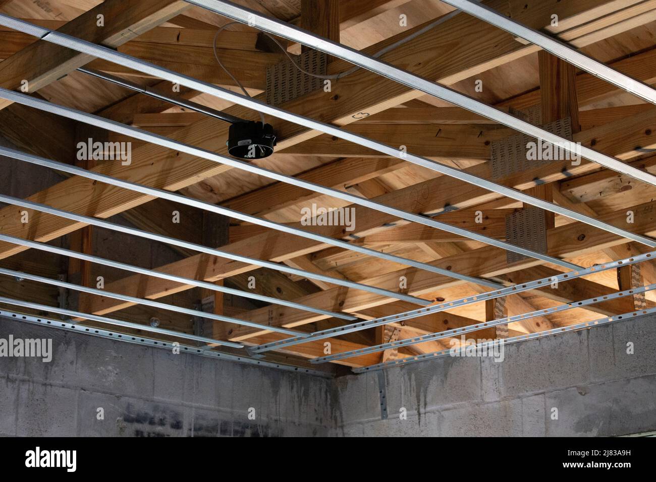 Overhead ceiling struts for easy overhead drywall hanging in an luxury ...