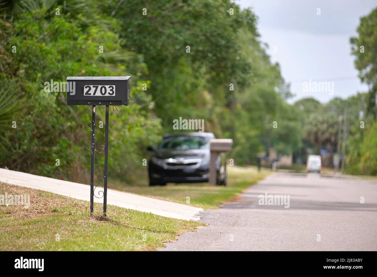 Typical american outdoors mail box on suburban street side Stock Photo ...