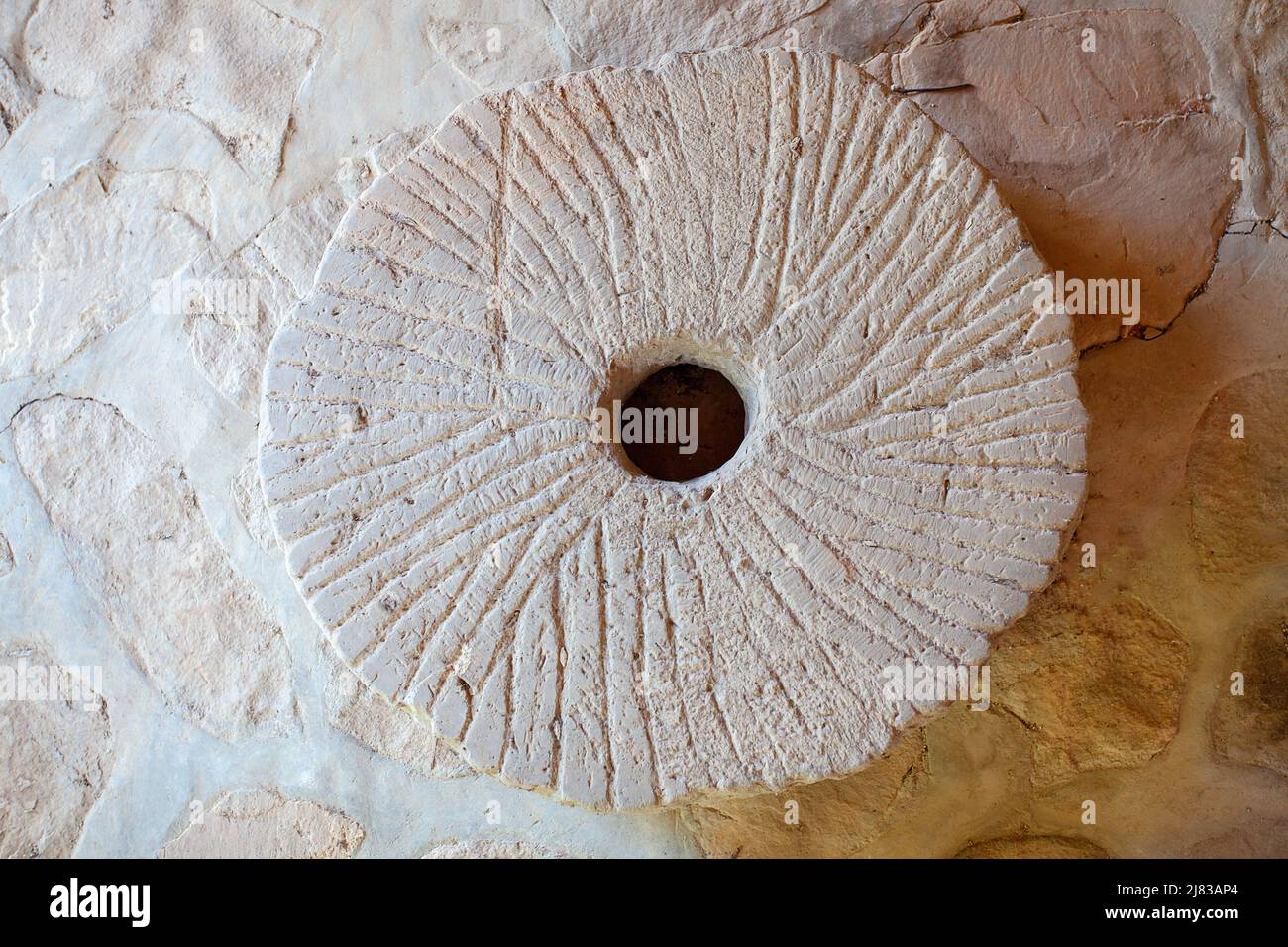 The Millstone: An old stone relic of Industry Stock Photo - Alamy