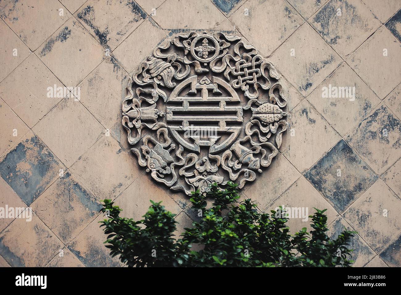 Chinese religious stone carving of flowers Stock Photo - Alamy