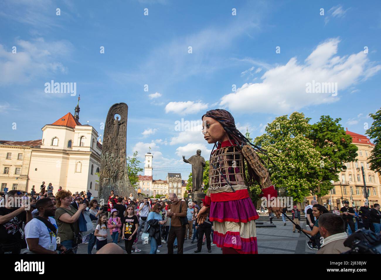 Lviv, Ukraine - May 11, 2022: Little Amal, a giant puppet representing ...