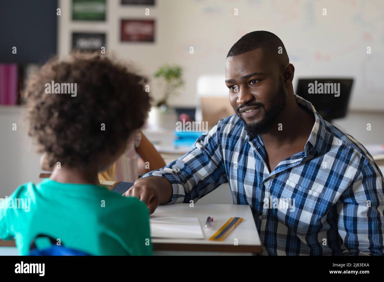 African american male teacher hi-res stock photography and images - Alamy