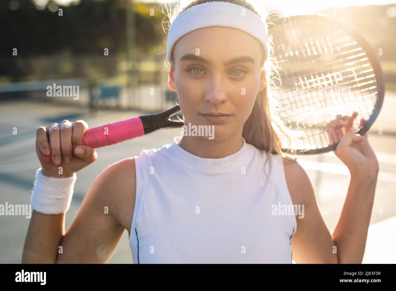 Portrait of confident young beautiful caucasian female player with ...
