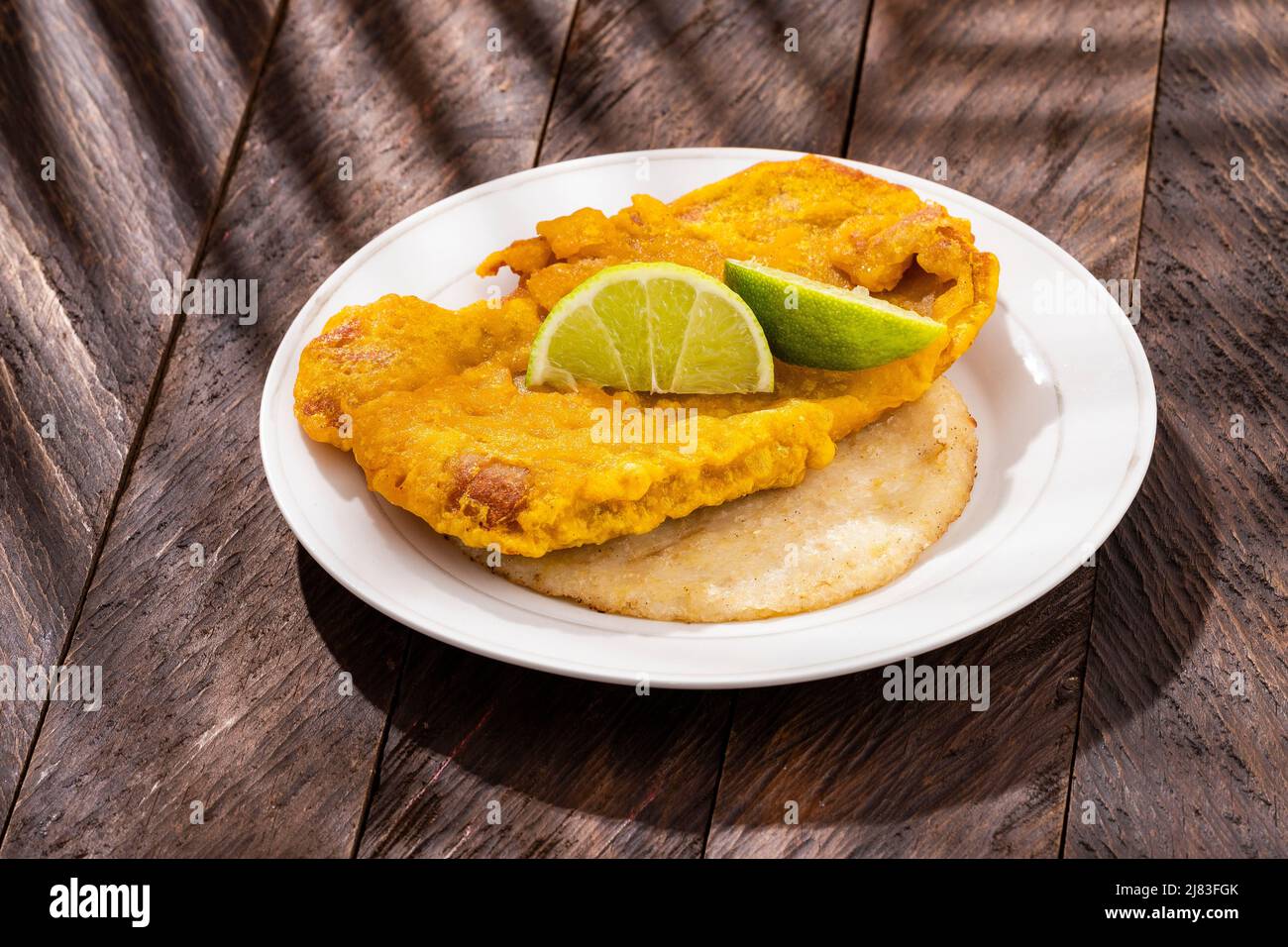 Rich fried dried fish torta - Traditional Colombian dish Stock Photo ...