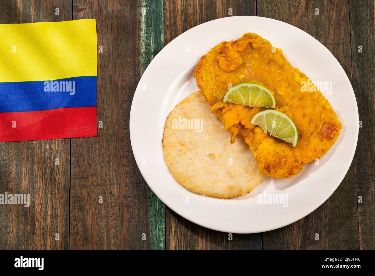 Breaded fish fillet - Traditional Colombian food Stock Photo - Alamy