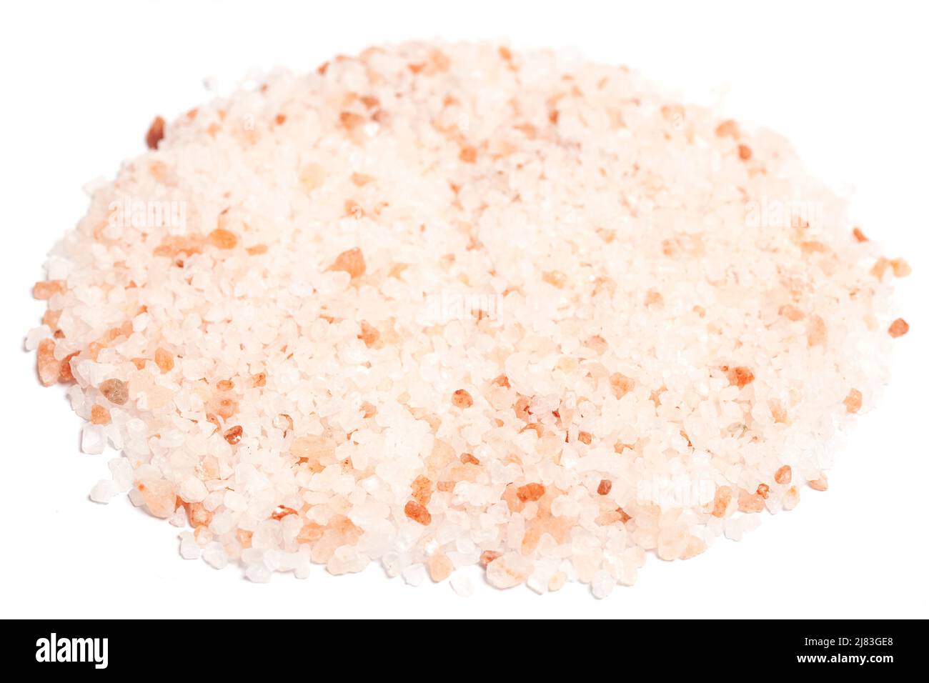 Heap of large crystals pink Himalayan salt isolated on white background ...