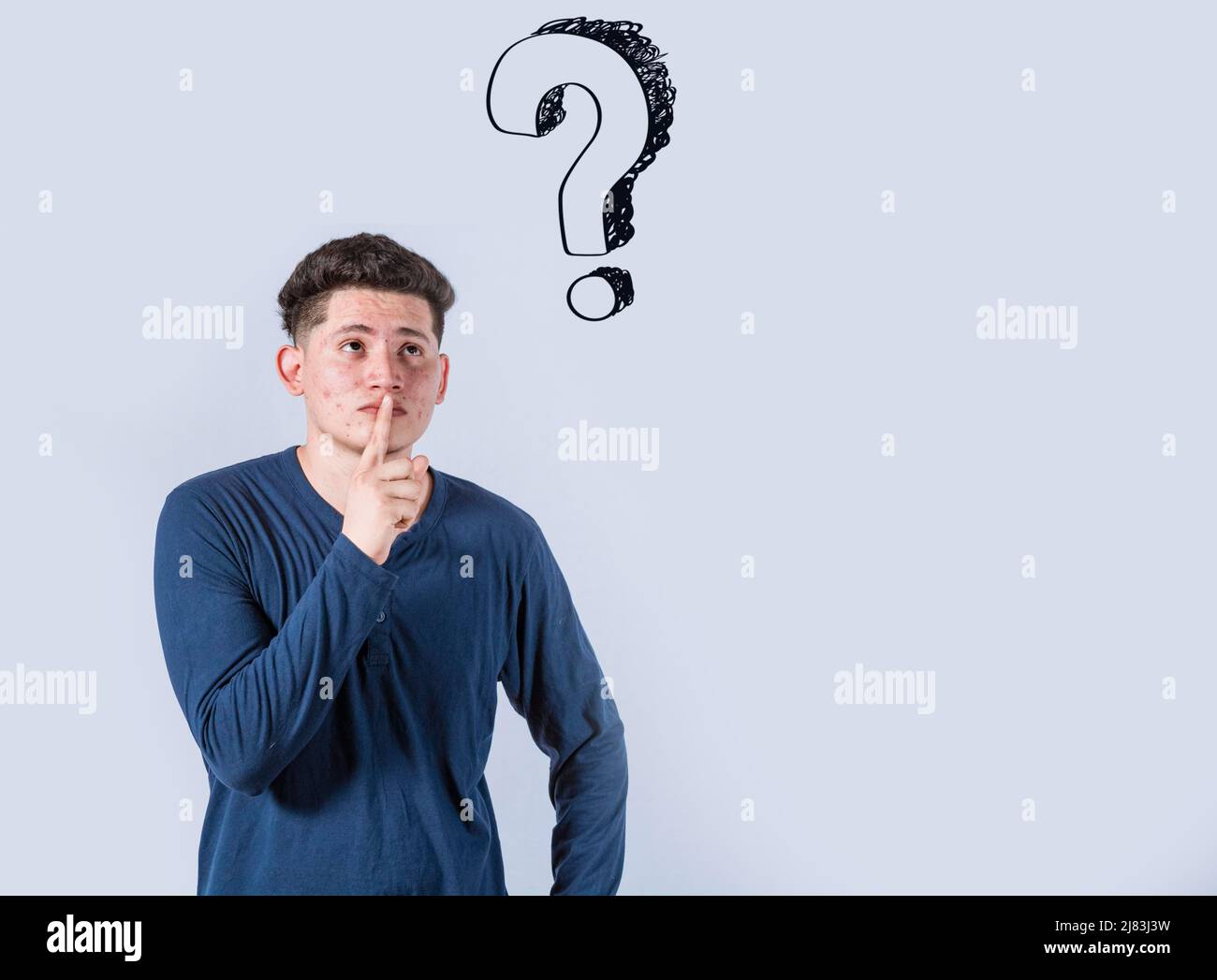 Thoughtful young man looking up with exclamation marks, Thoughtful man ...