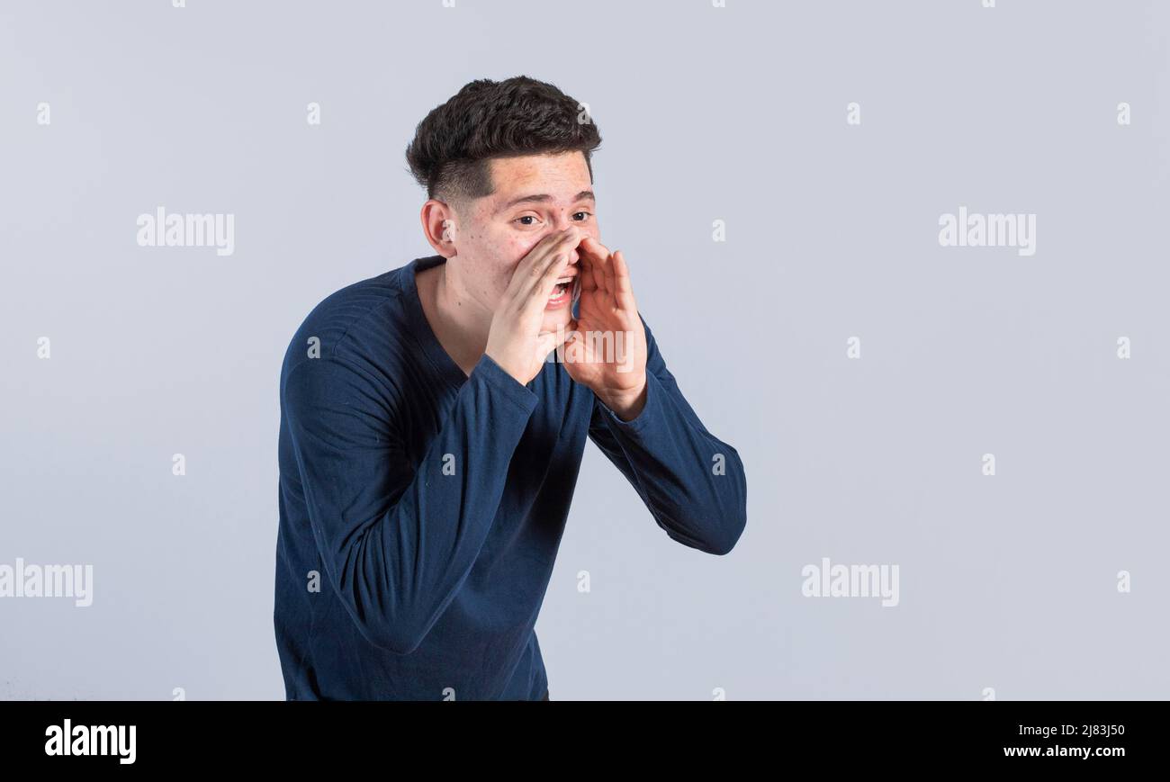 A person announcing and yelling, Handsome man shouting an announcement ...