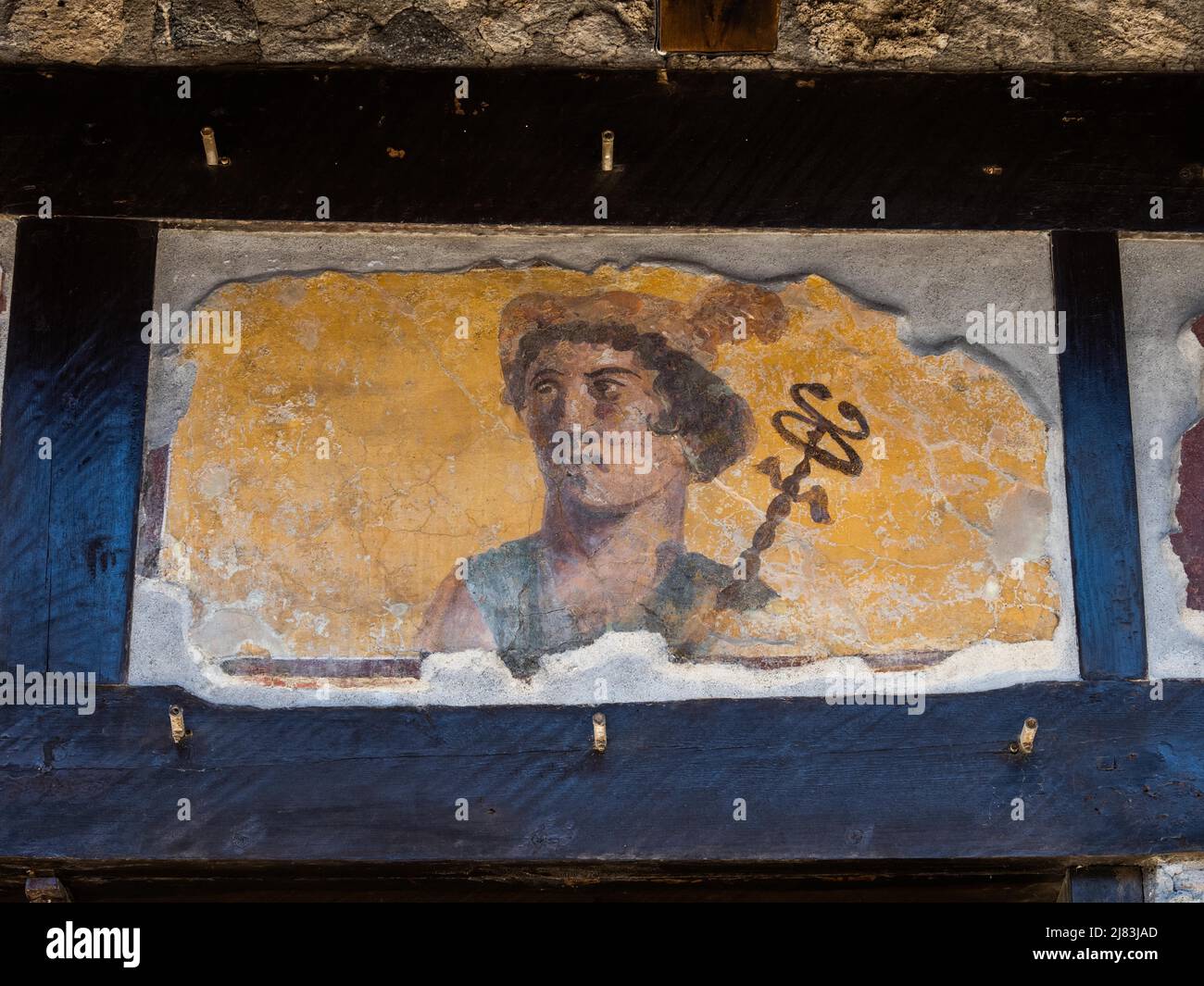 Painted head of a patron god, Taberna of the Four Deities, Via ...