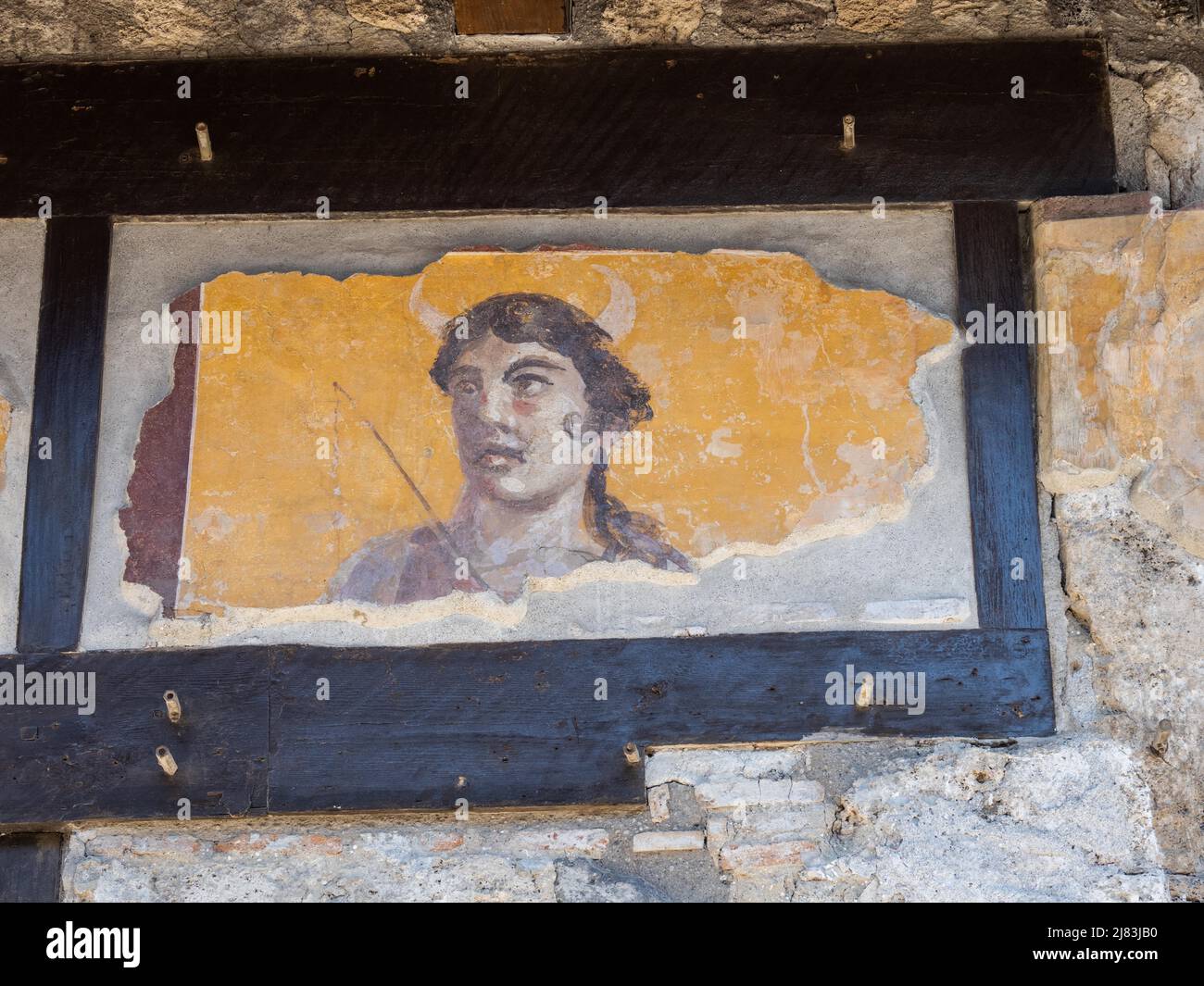 Painted head of a patron god, Taberna of the Four Deities, Via ...