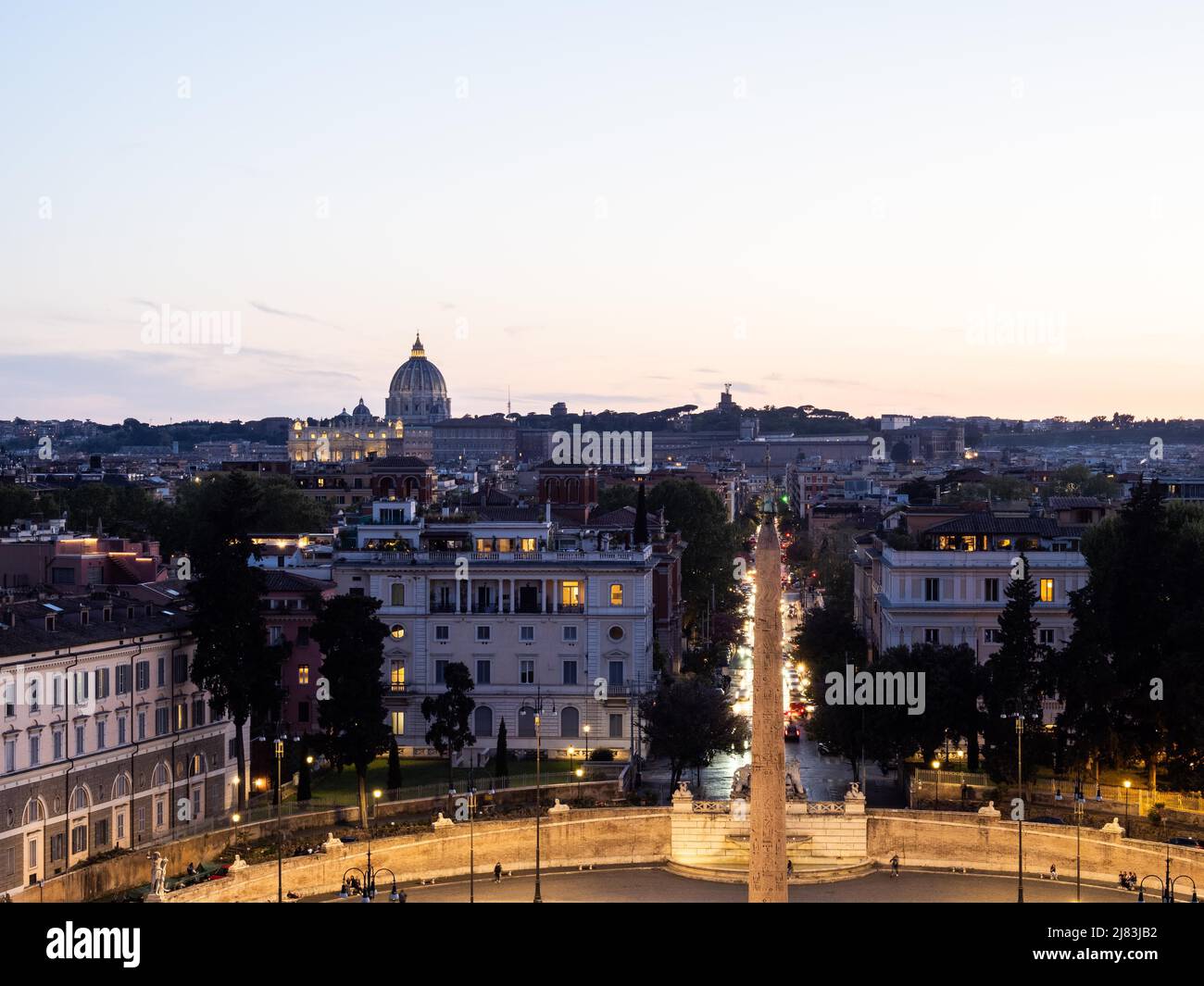 Dome of St. Peter's Basilica at dusk, obelisk in front on Piazza del ...