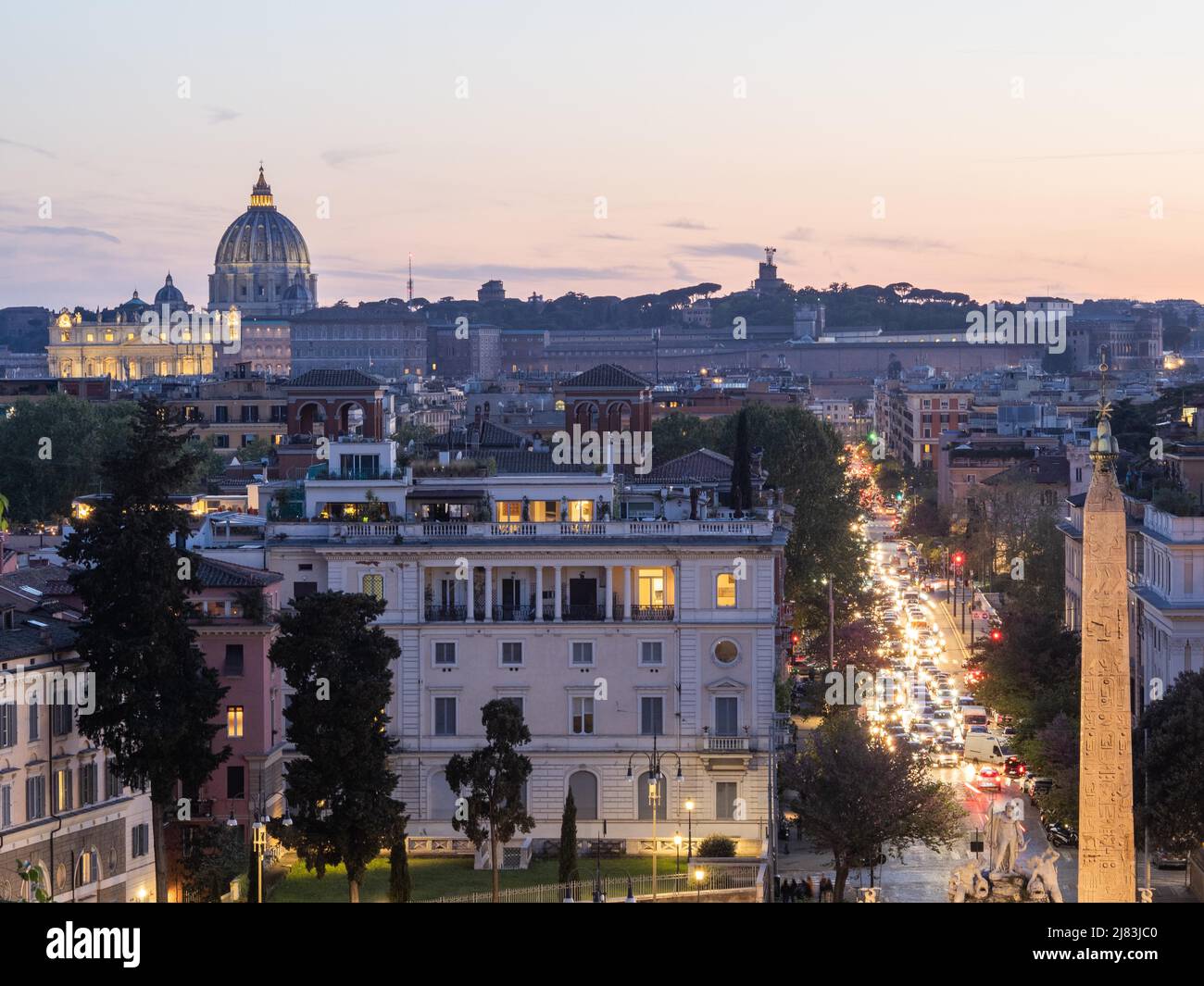 Dome of St. Peter's Basilica at dusk, obelisk in front on Piazza del ...