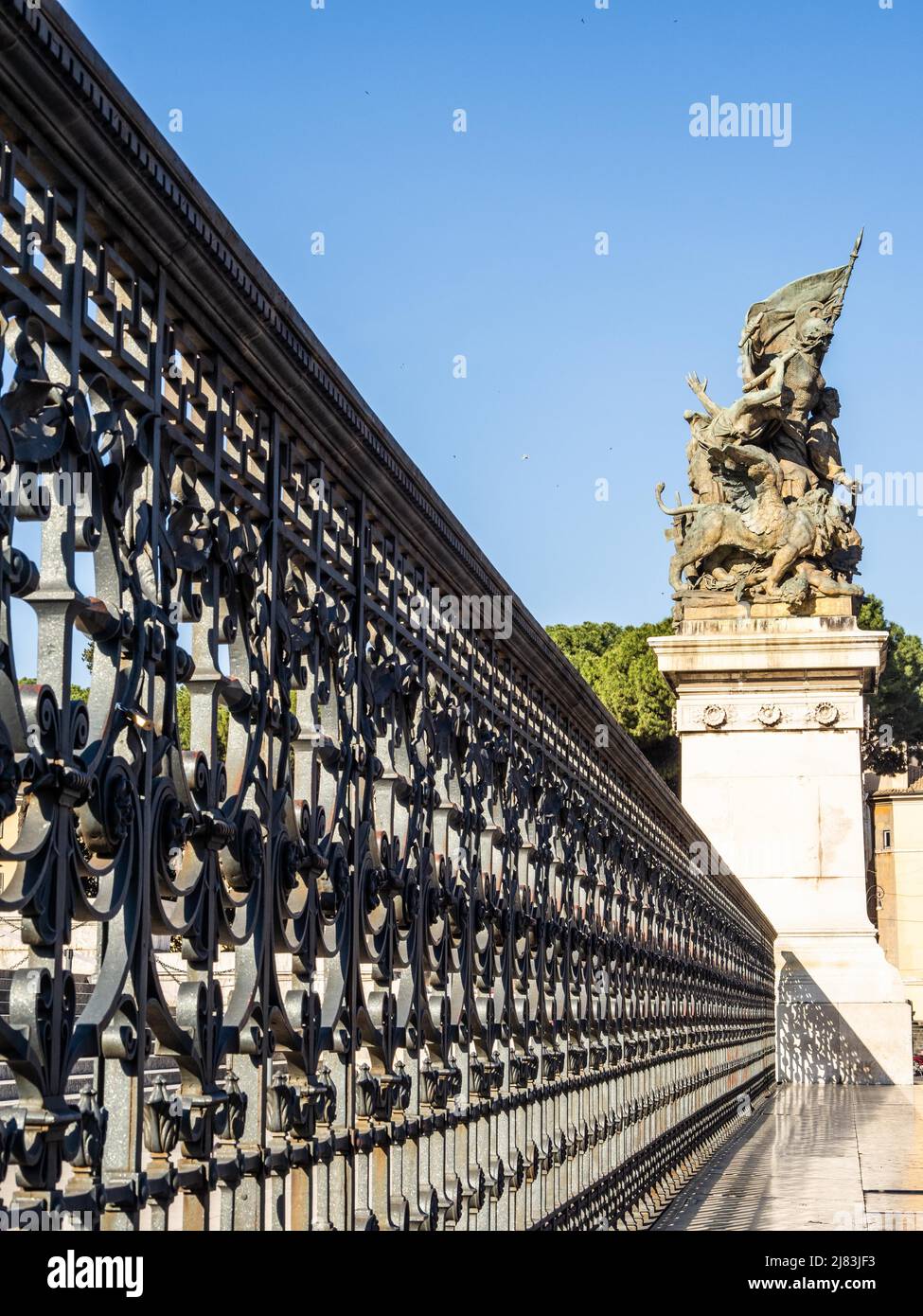 Shade by the fence in front of the Monumento Nazionale a Vittorio ...