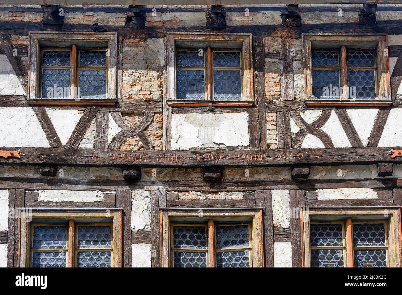 Facade with bull's-eye windows, half-timbered house from 1409 being ...